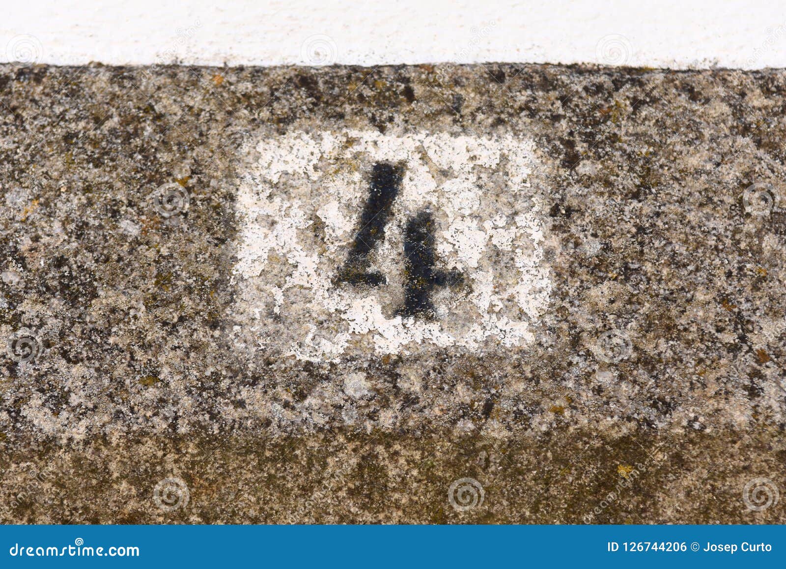 Number four on the wall stock photo. Image of house - 126744206