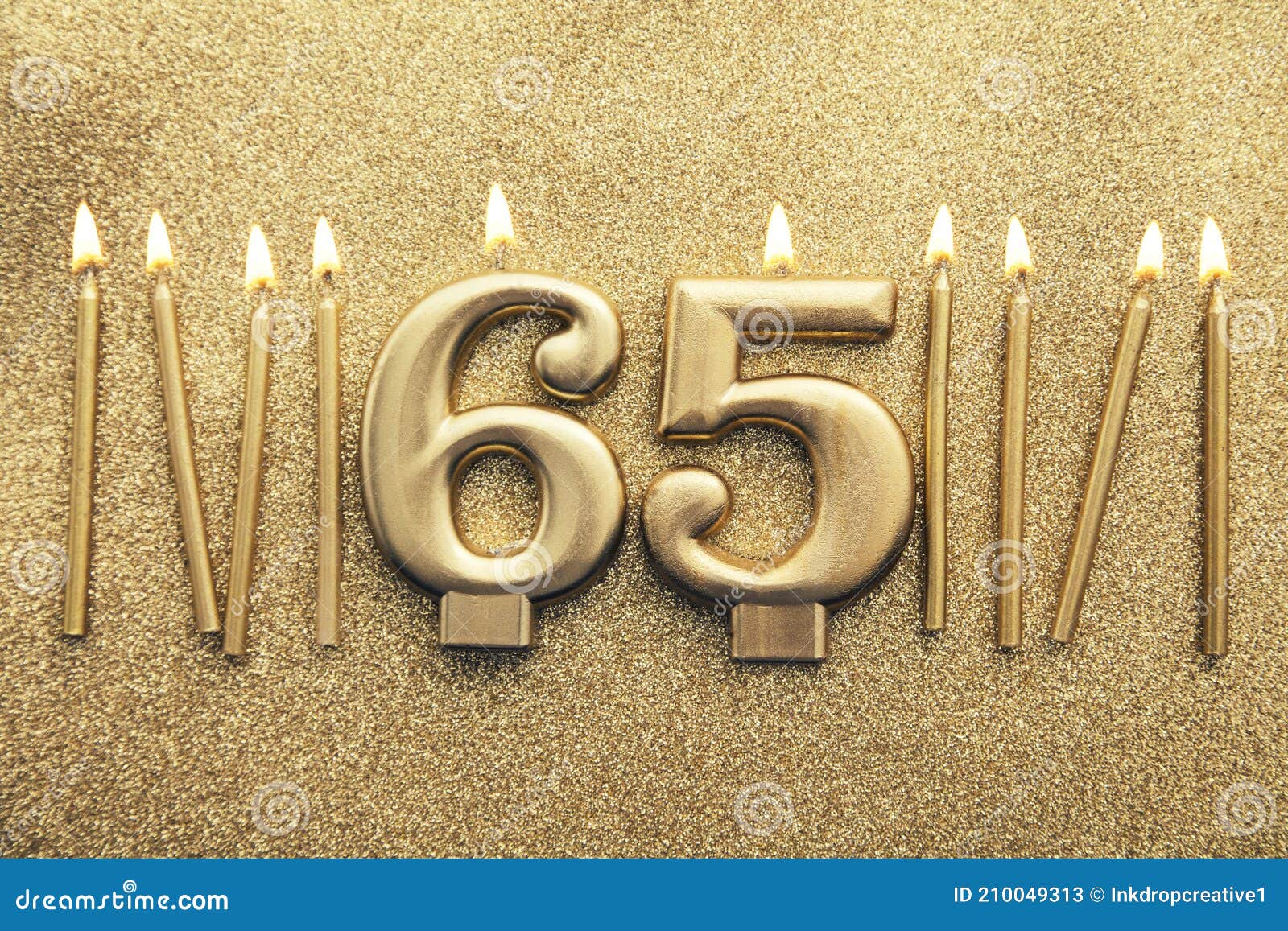 Number 65 Gold Celebration Candle On A Glitter Background Stock Image
