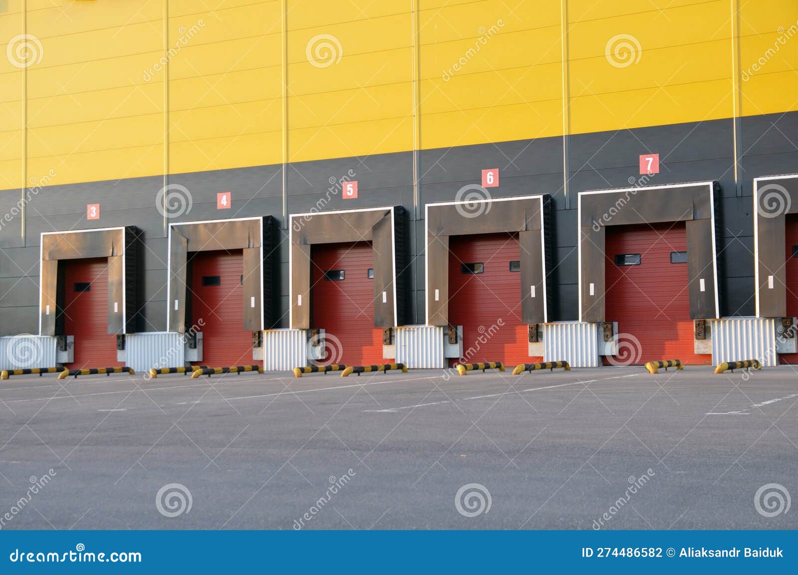 A Number of Loading Docks. Modern Warehouse Building Stock Photo ...