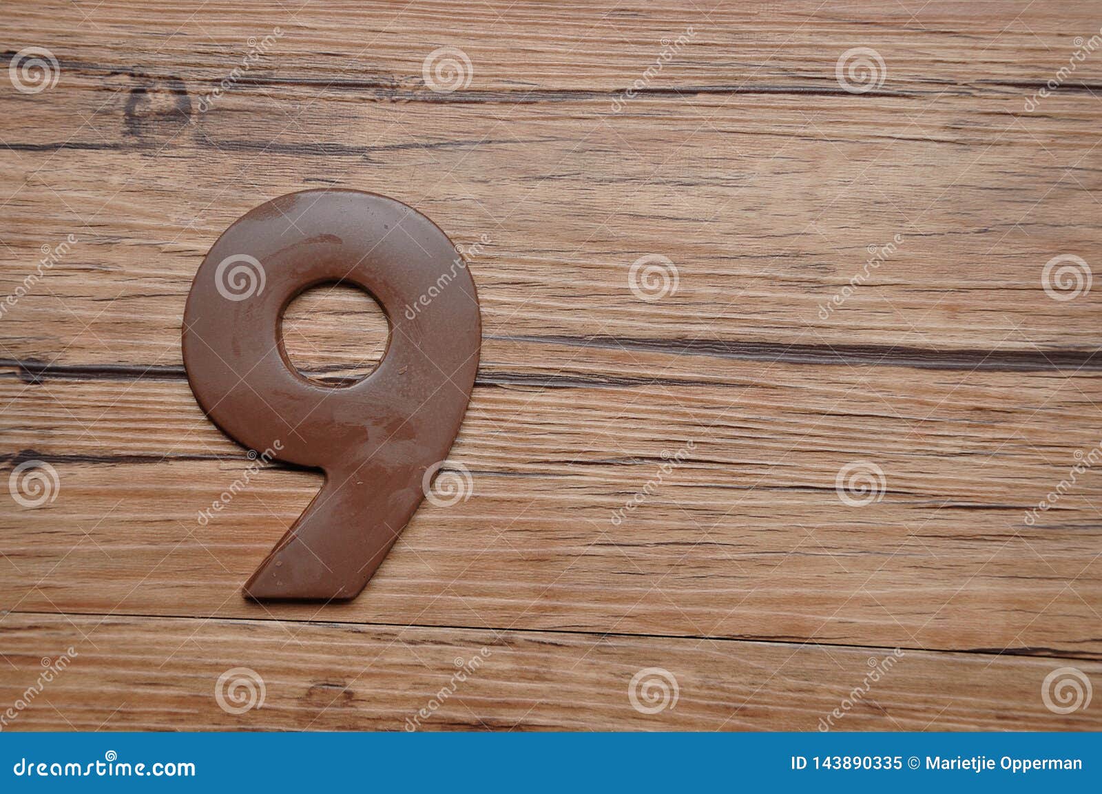 A Number 9 Made Out of Chocolate Stock Image - Image of wooden ...