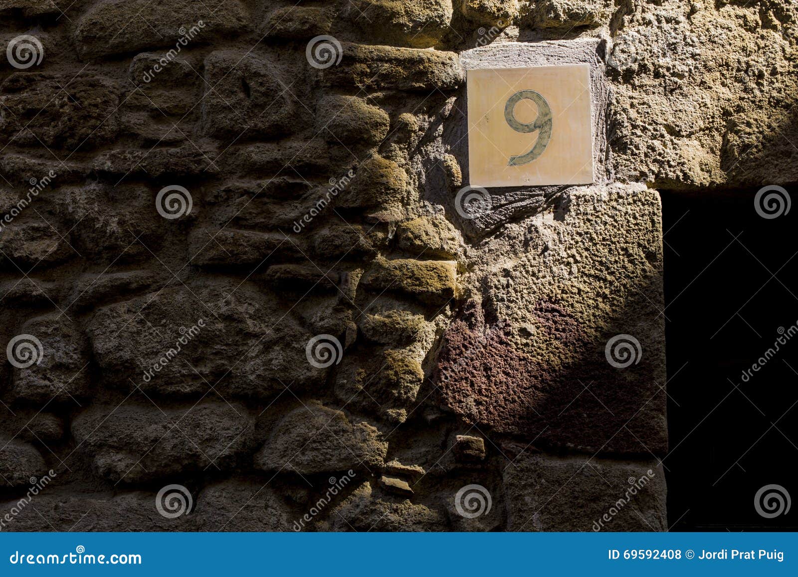 Number Nine Shining on a Rock Wall Stock Photo - Image of painted ...