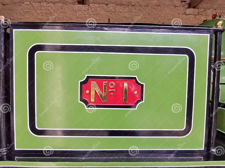 Number One Brass Engine Plate Stock Image - Image of vehicle, yellow ...