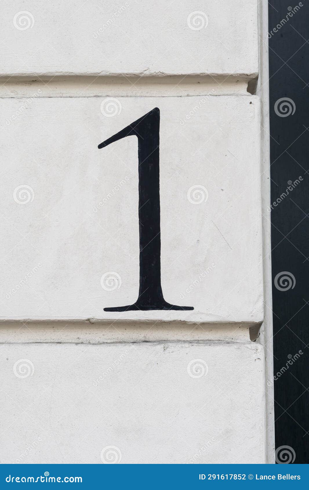 Number One Door Number Hand Painted in Black on White Wall Stock Photo ...