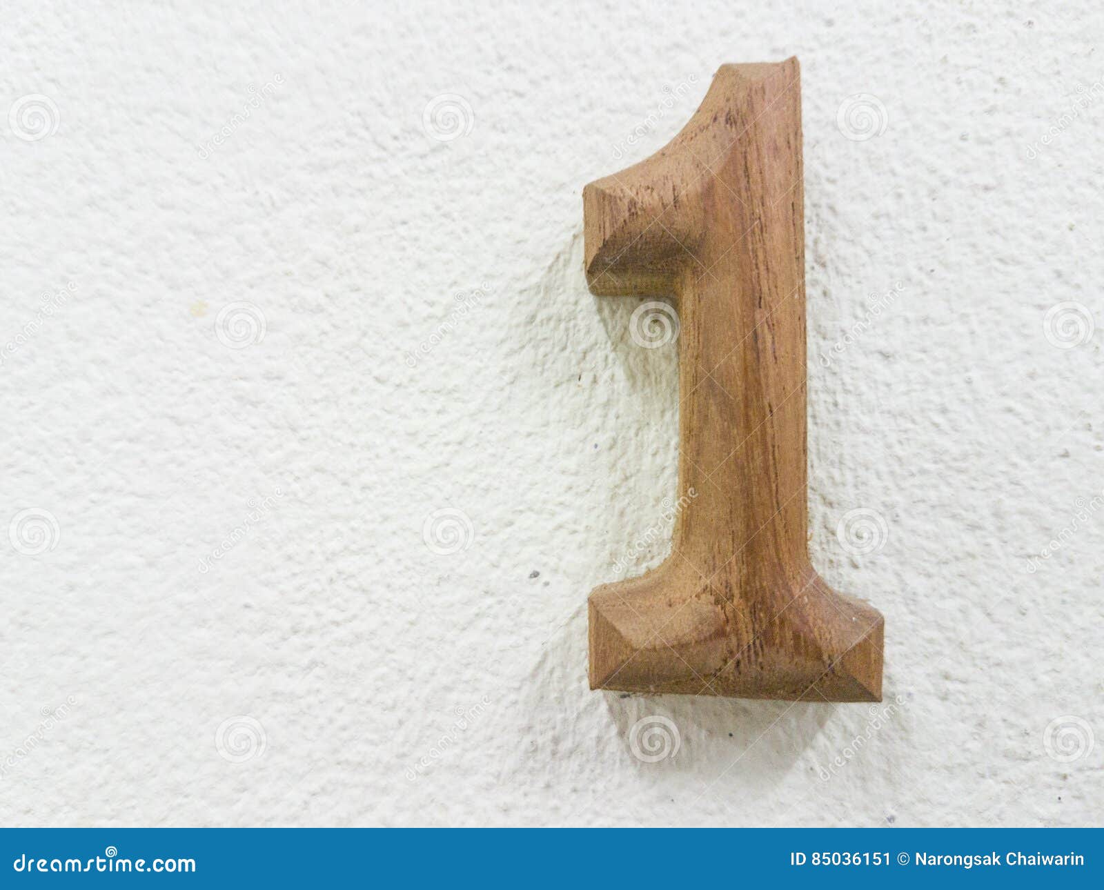 Number one on white wall stock image. Image of graphic - 85036151