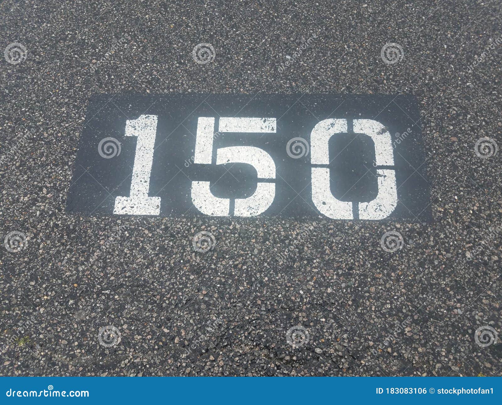 Number 150 Painted on Black Asphalt or Pavement Stock Photo - Image of ...