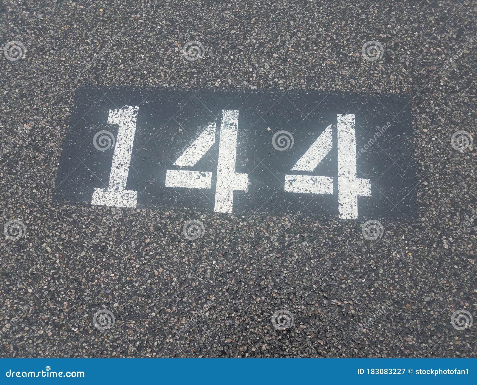 Number 144 Painted on Black Asphalt or Pavement Stock Image - Image of ...