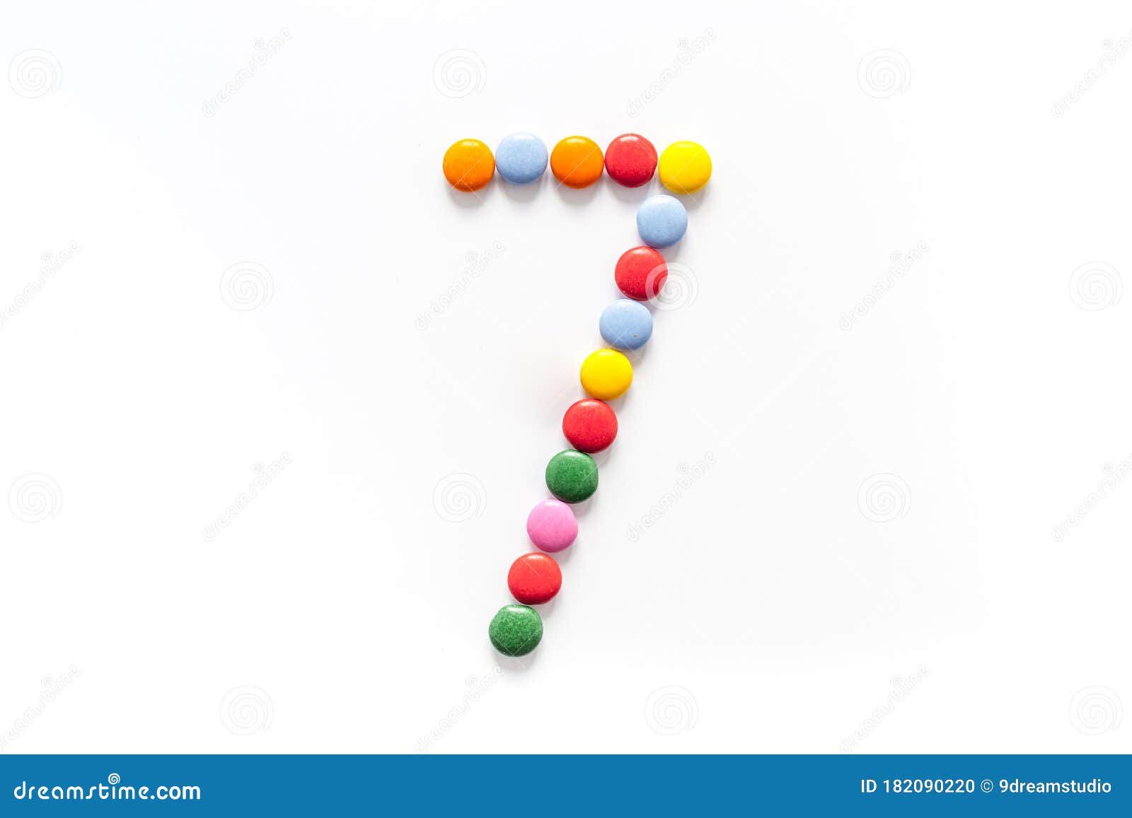 Number 7 - Seven - Lined with Sweets on Isolated Top-down Stock Photo ...