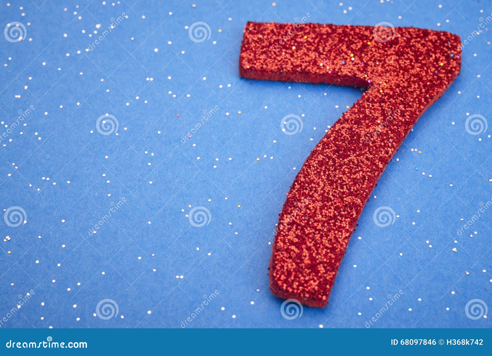 Number Seven Red Color Over A Blue Background. Anniversary Stock Photo ...