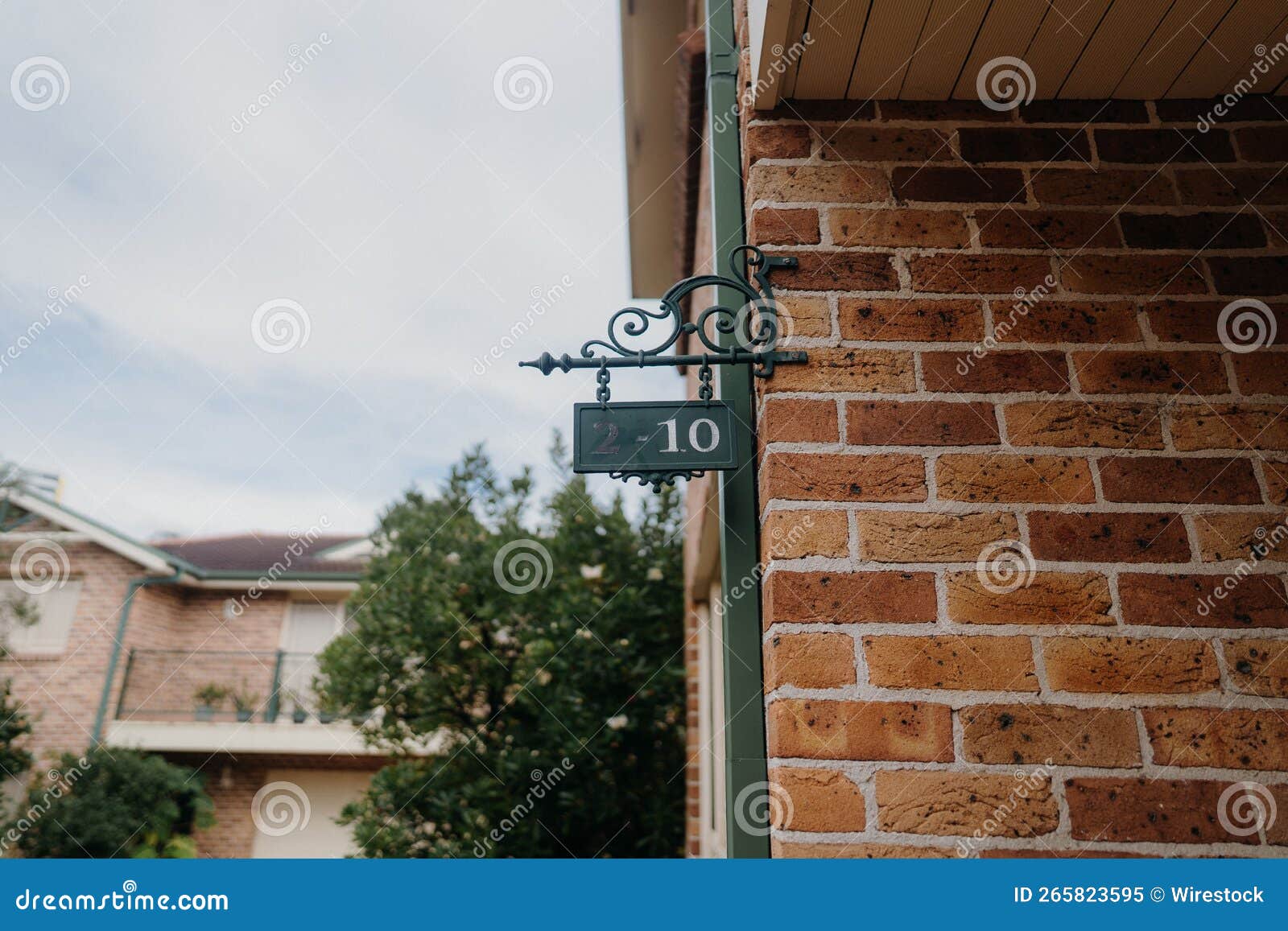 Number Sign on a Brick Wall of a Building Stock Image - Image of ...