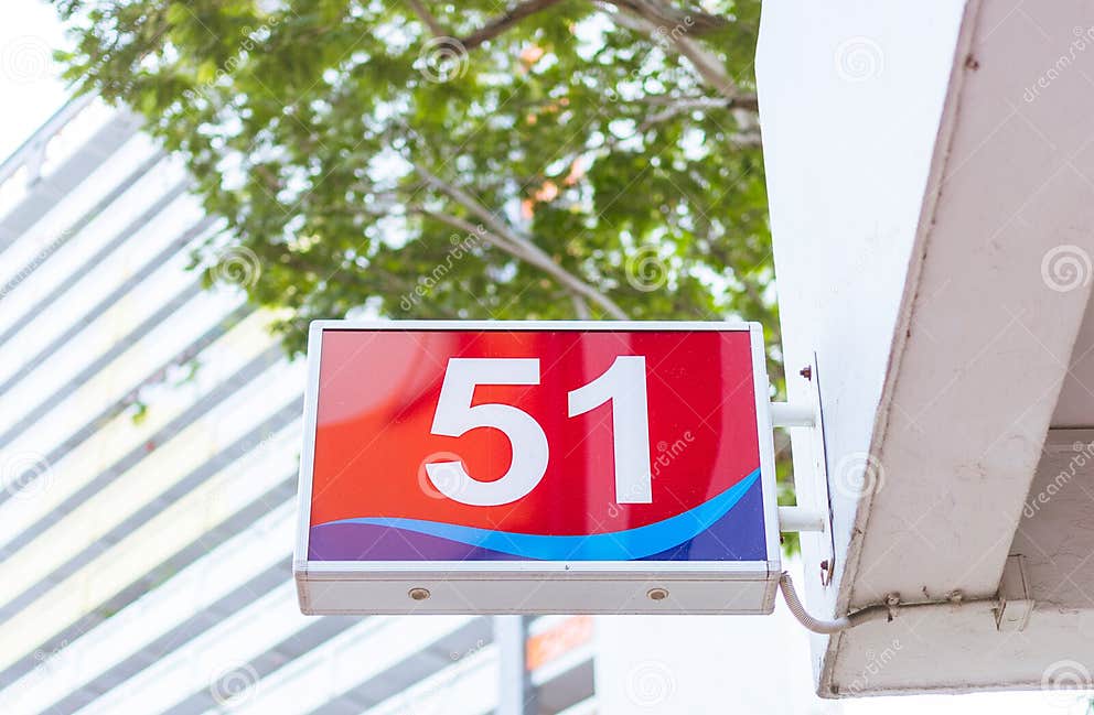 Number 51 Sign Hung on Side of a Building. Stock Photo - Image of ...