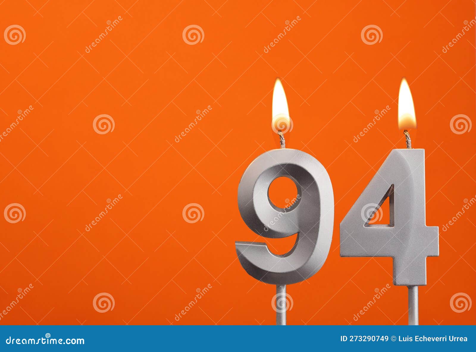 Number 94 - Silver Anniversary Candle on Orange Background Stock ...
