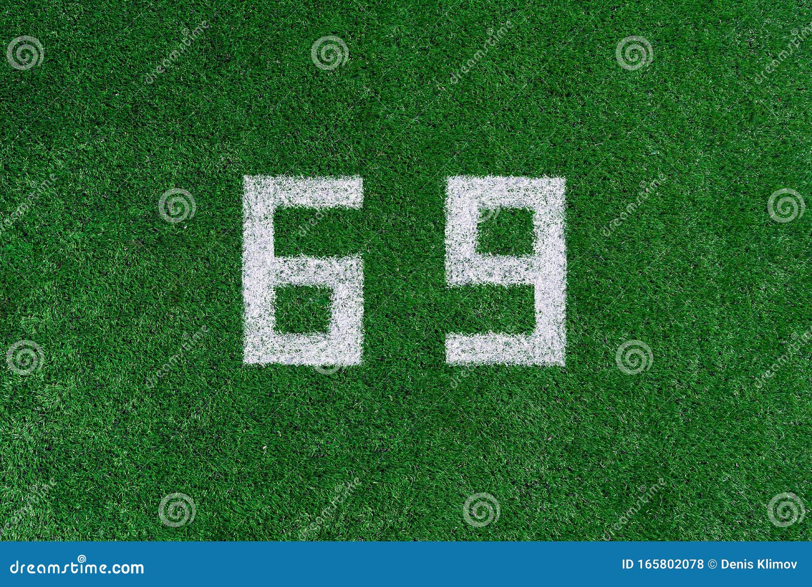 The Number Sixty-nine, Painted White on the Green Stock Photo - Image ...