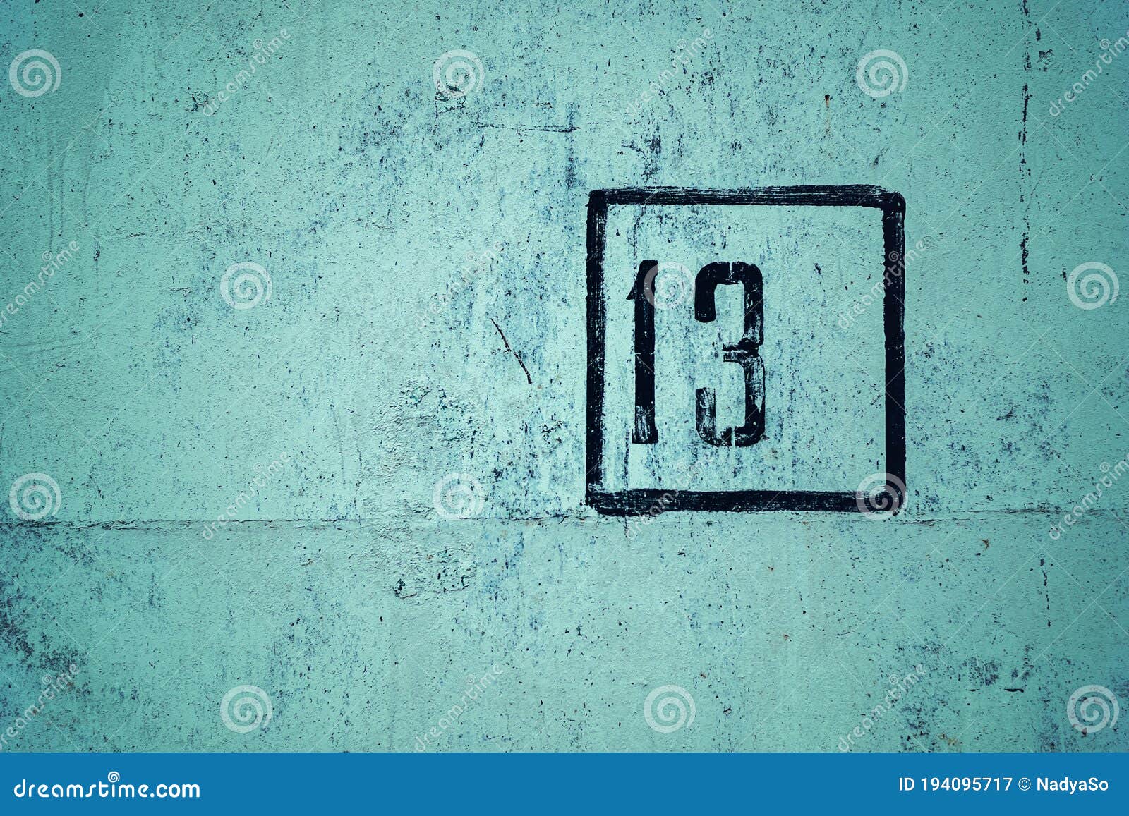 Number 13 is Stenciled in Black Frame on Green Concrete Wall, Copy ...