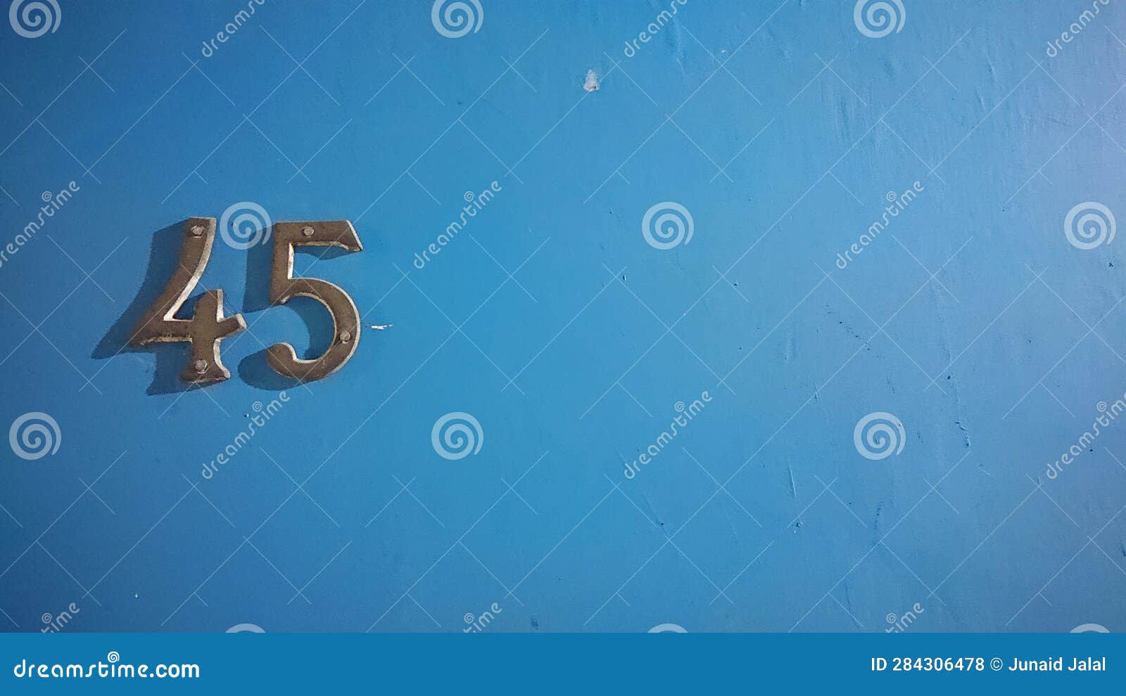 Number 45 Symbol on Blue Wall Stock Photo - Image of text, screenshot ...