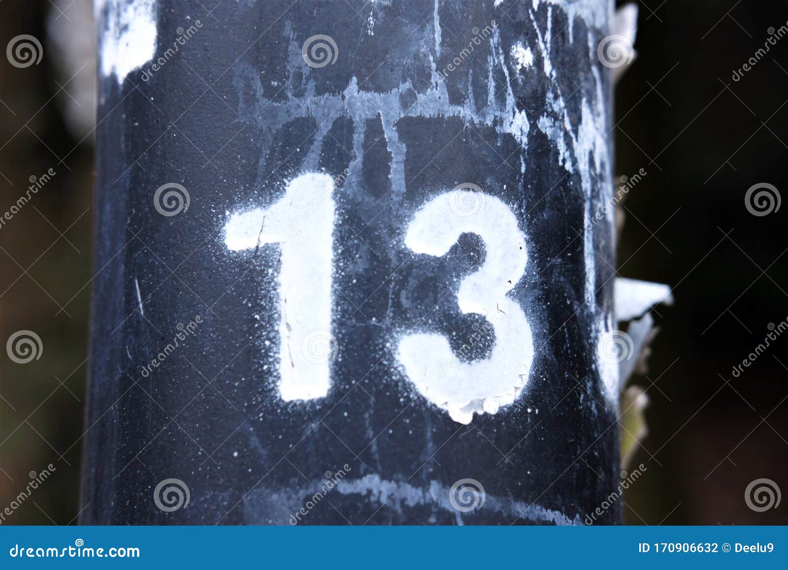 Number Thirteen Sprayed on a Lampost - Bad Luck Concept Stock Photo ...