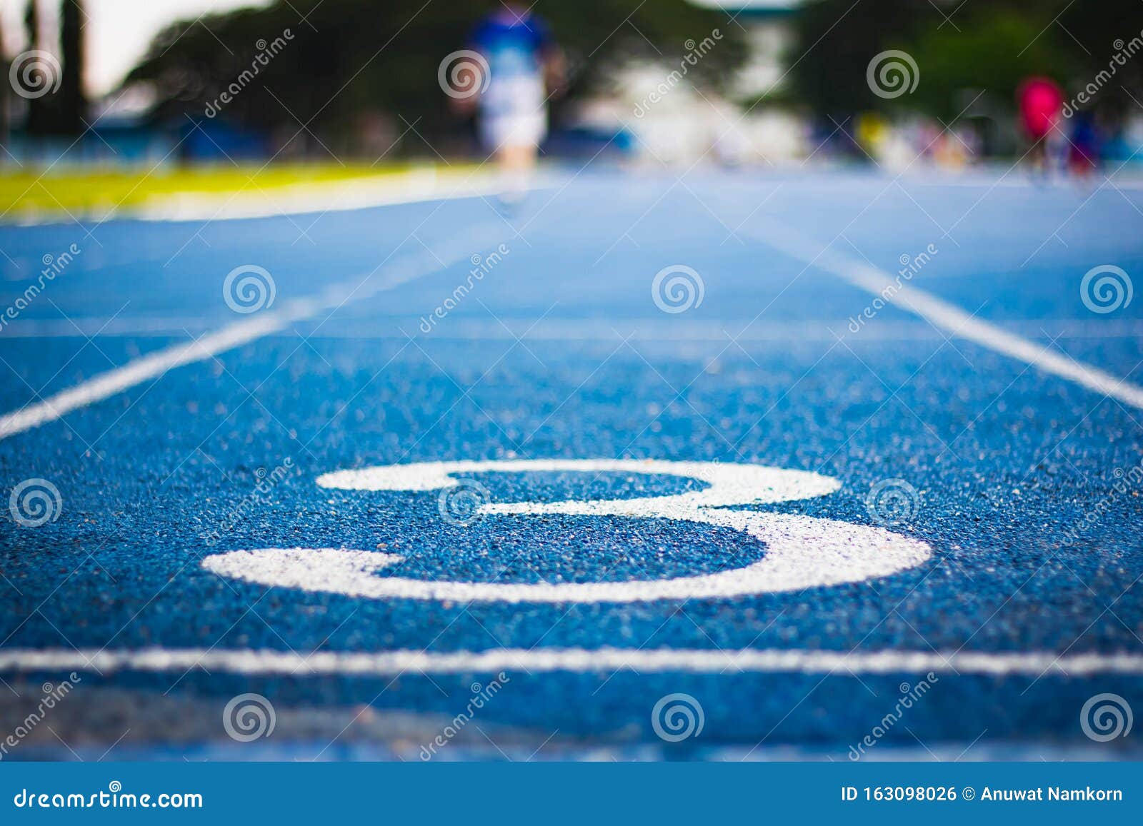 Number Three on the Start of a Running Track .Blue Treadmill with ...