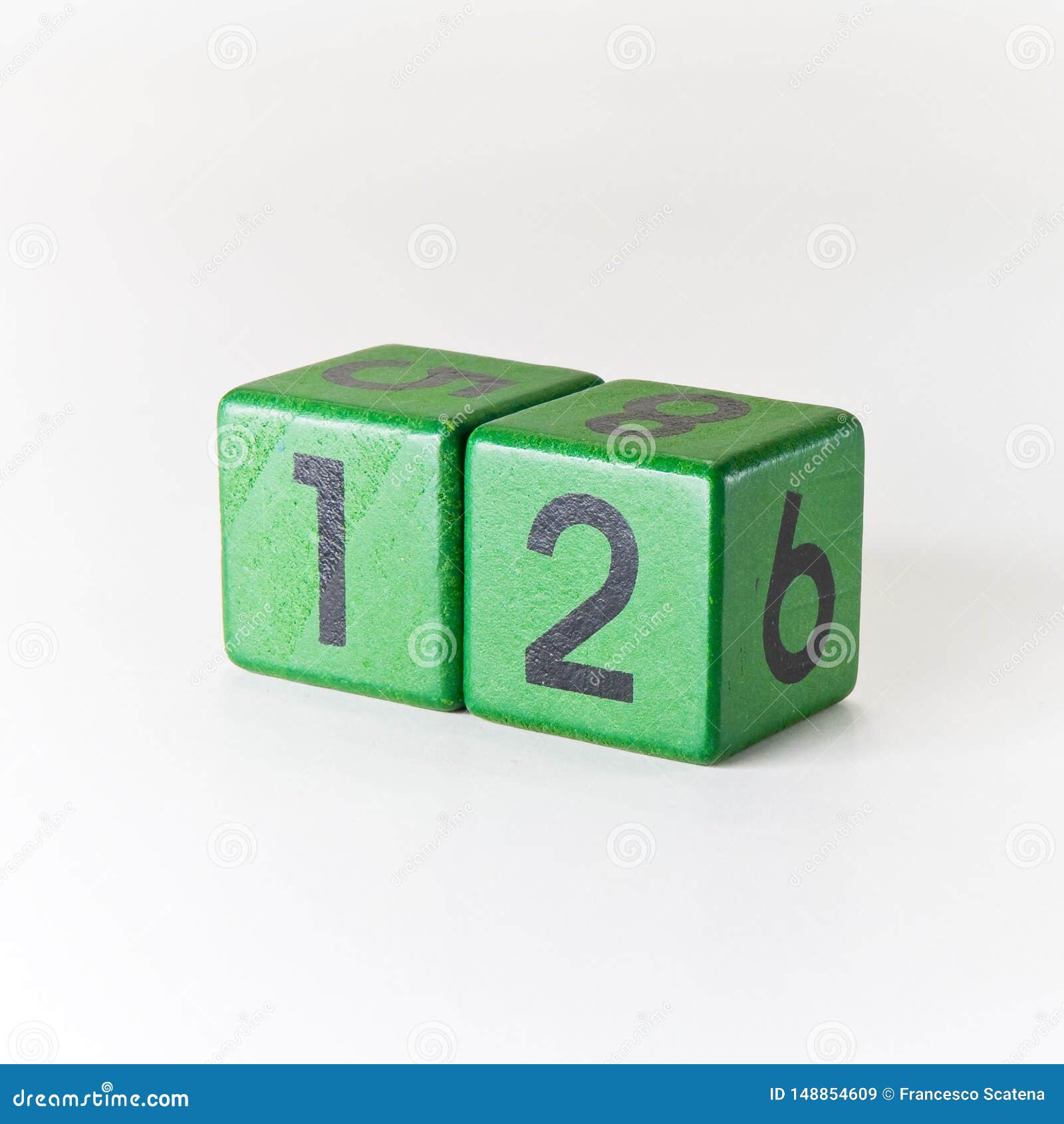 Number Twelve Written on a Wooden Green Cube on White Background Stock ...