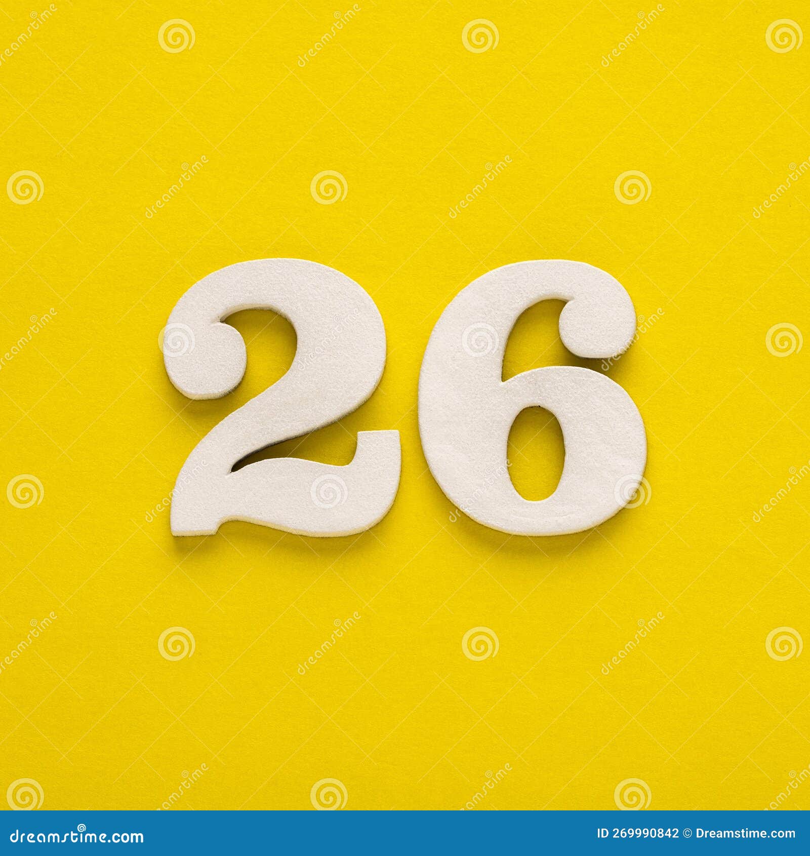 Number 26 - Two Figures in White on a Yellow Background Stock Photo ...