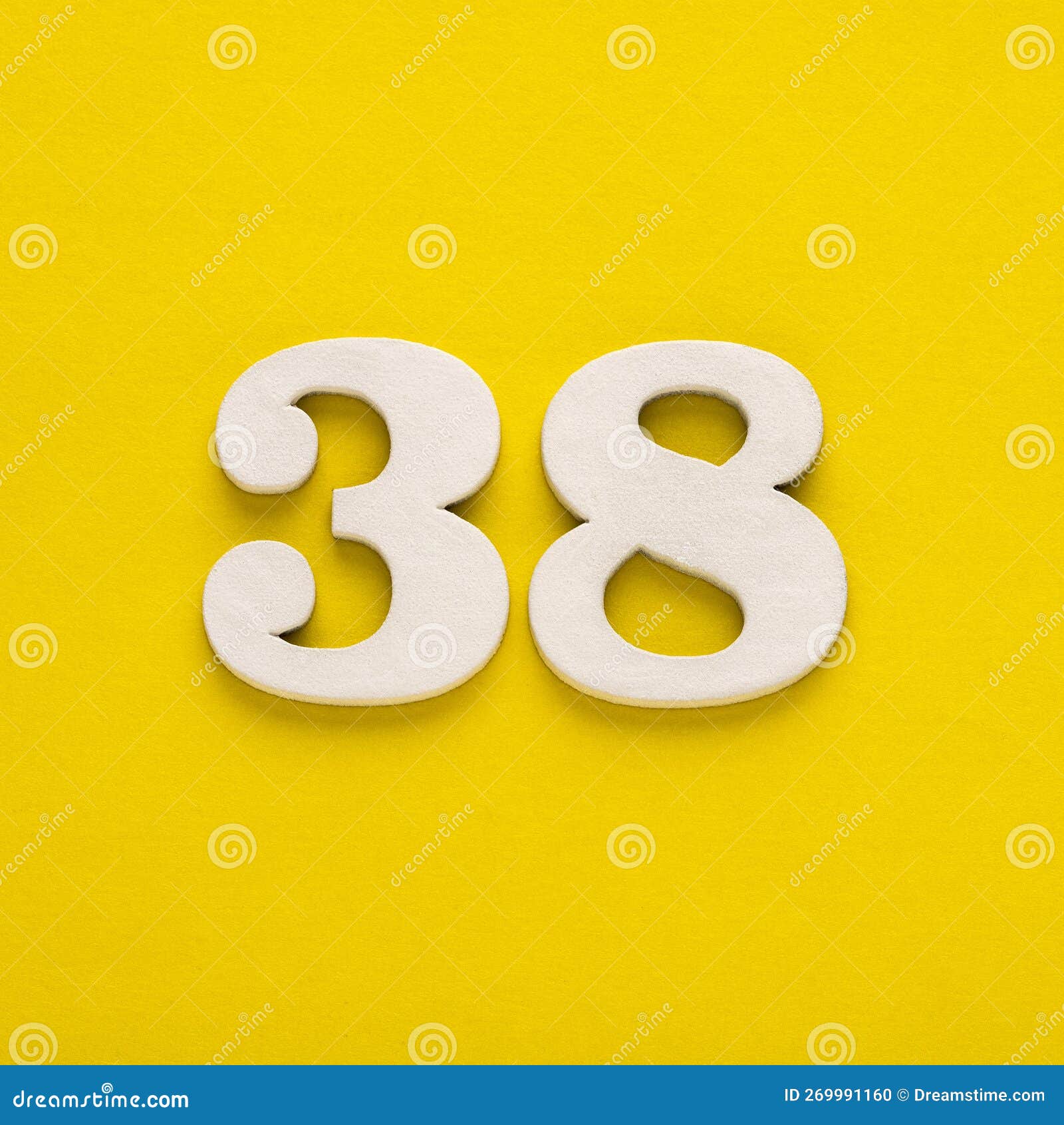 Number 38 - Two Figures in White on a Yellow Background Stock Photo ...
