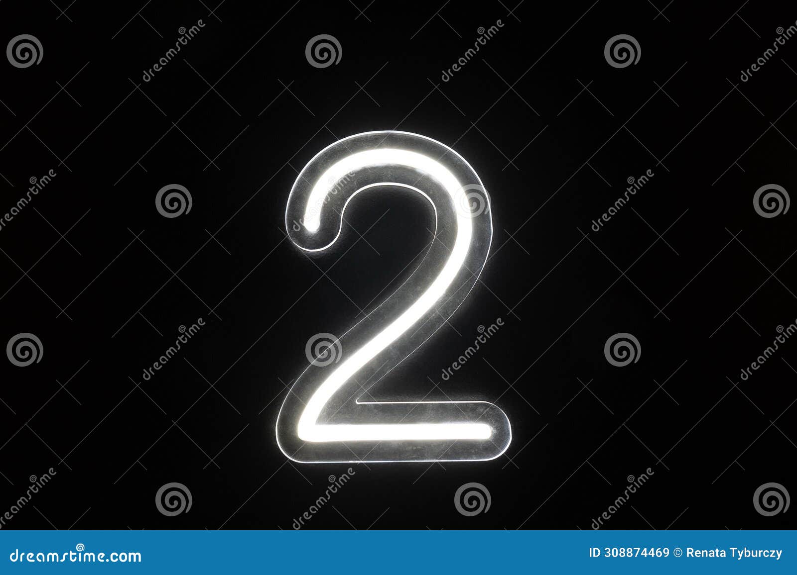 Number Two Glowing on the Dark Background. Close Up of Bright Number 2 ...
