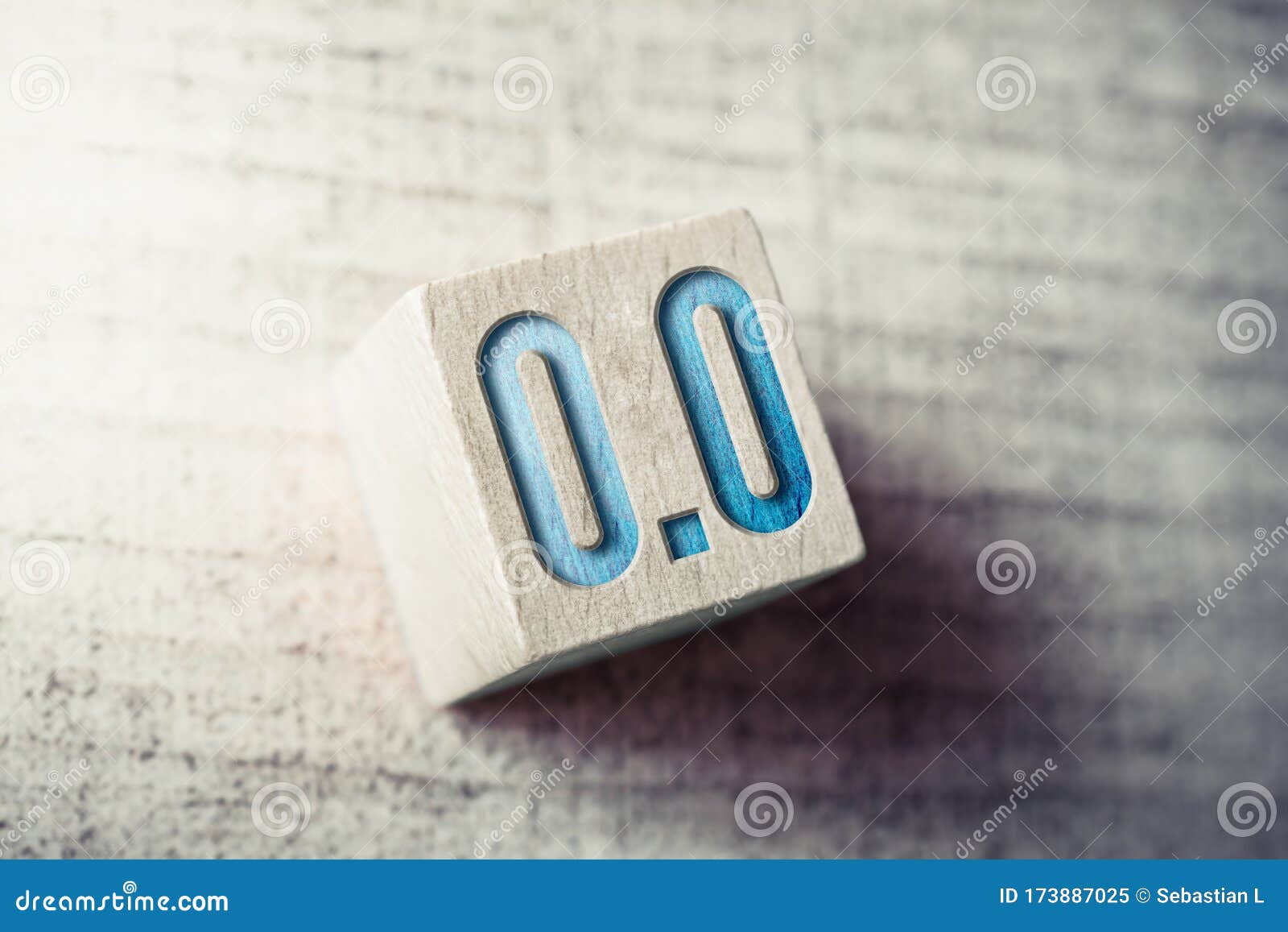 Number 0.0 on a Wooden Block on a Table Stock Image - Image of blurred ...