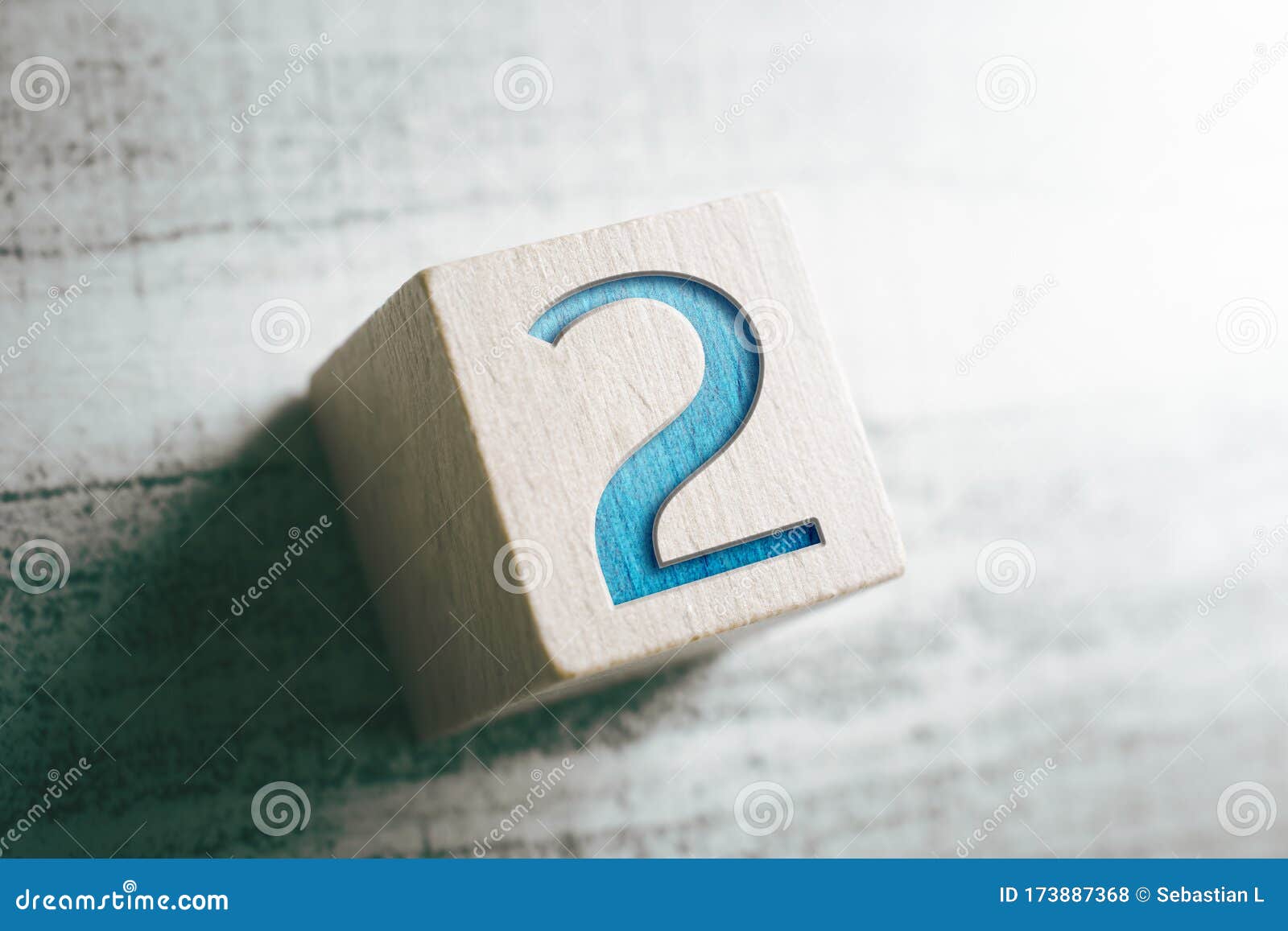 Number 2 on a Wooden Block on a Table Stock Photo - Image of control ...