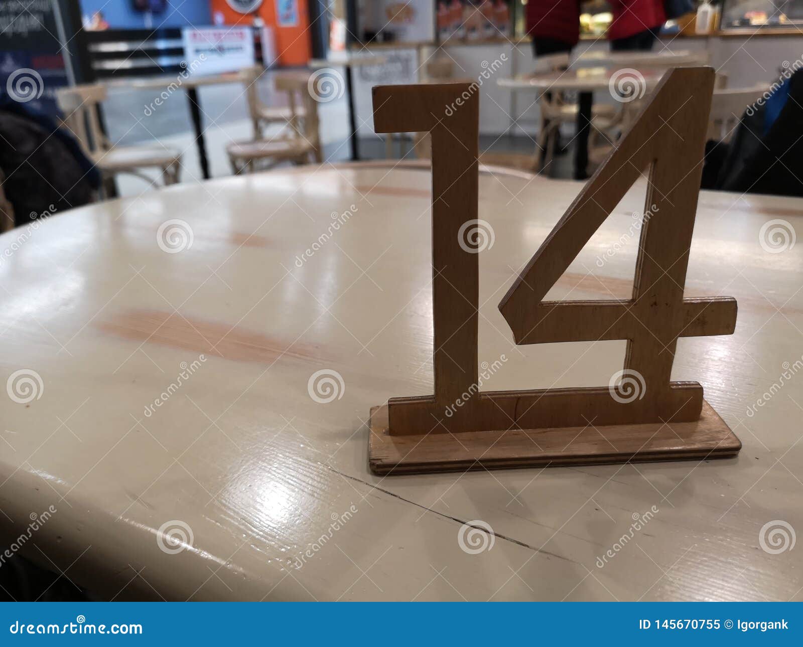 Number 14 on wooden table stock image. Image of table - 145670755