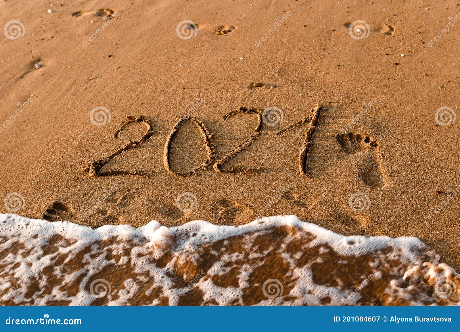 Number 2021 is Written on the Sand at Sea.. Waves and Sand. 2021 Stock ...