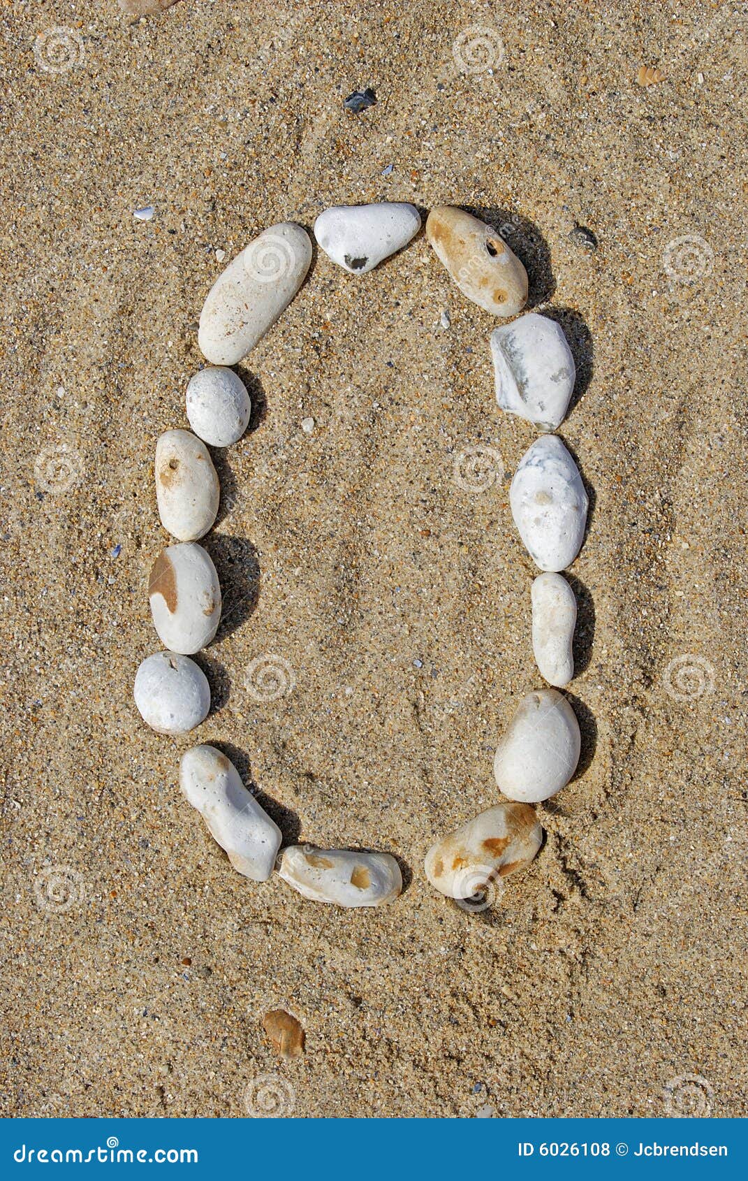 The number zero in stones stock photo. Image of sand, beach - 6026108