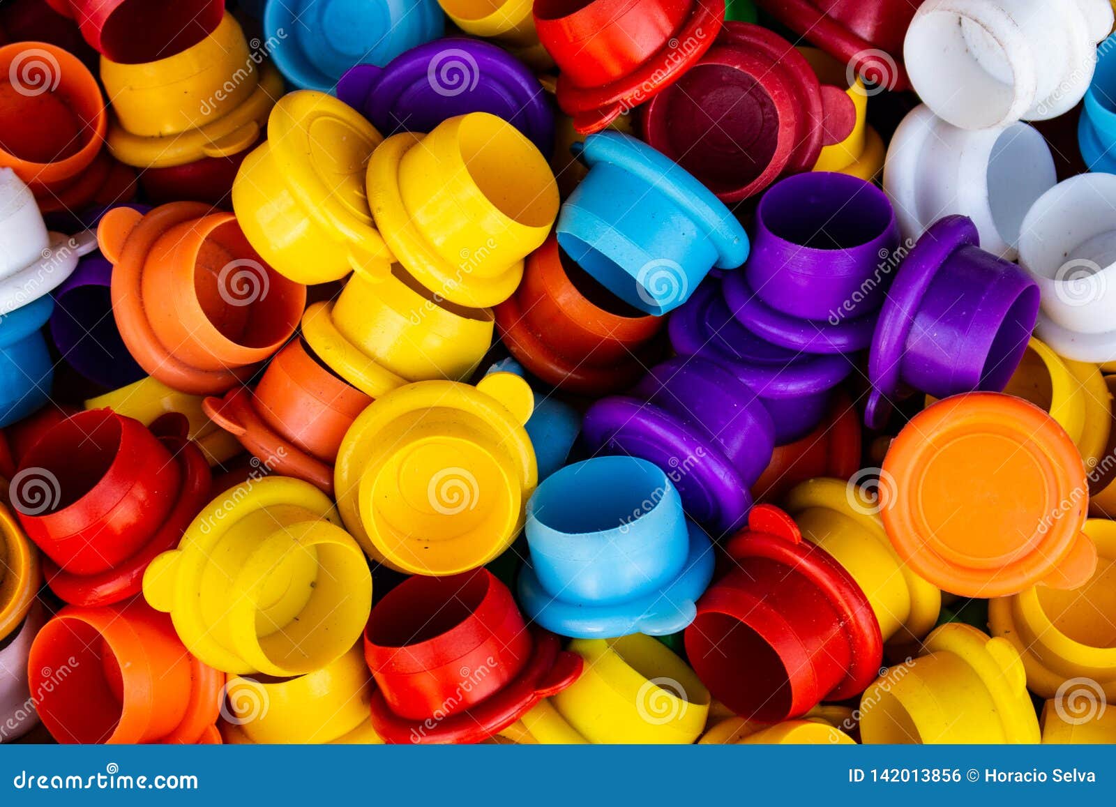 Numerous Rubber Caps of Different Colors Stock Photo - Image of glass ...