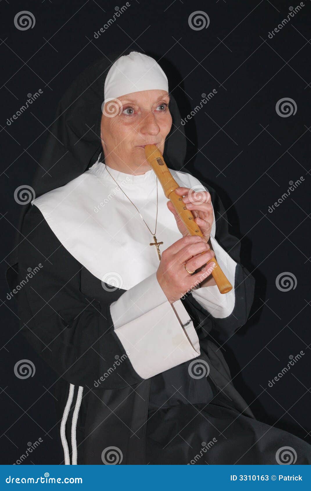 Nun playing the recorder stock image. Image of spiritual - 3310163
