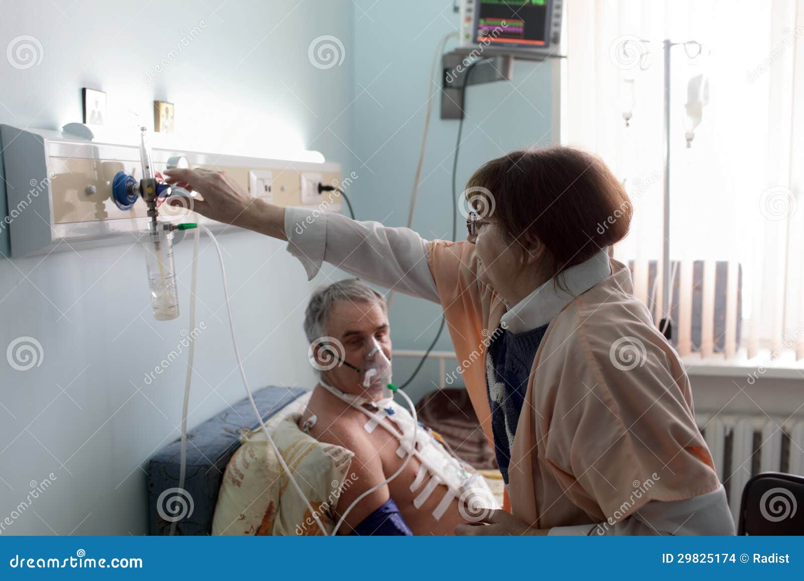 Nurse Adjusting the Level of Oxygen Stock Photo - Image of oxygen ...