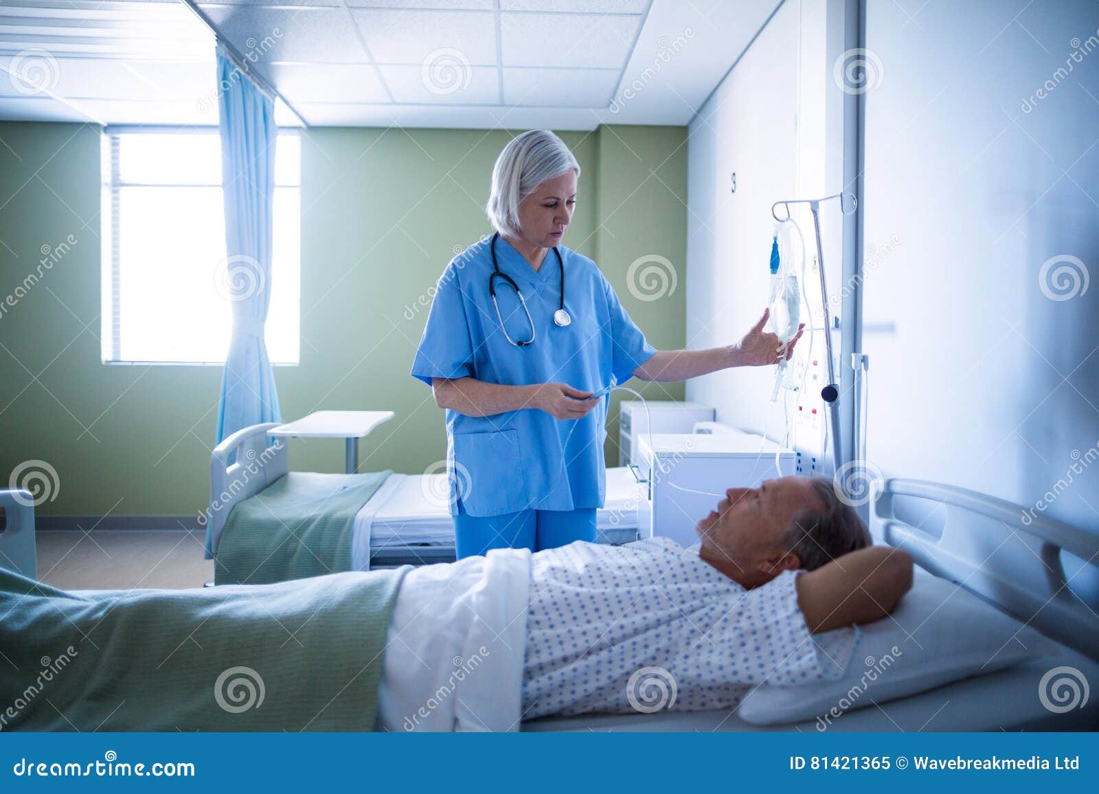 Nurse Adjusting Male Patient S Iv Drip Stock Image - Image of ... Nurse Adjusting Male Patient S Iv Drip Stock Image - Image of ...
