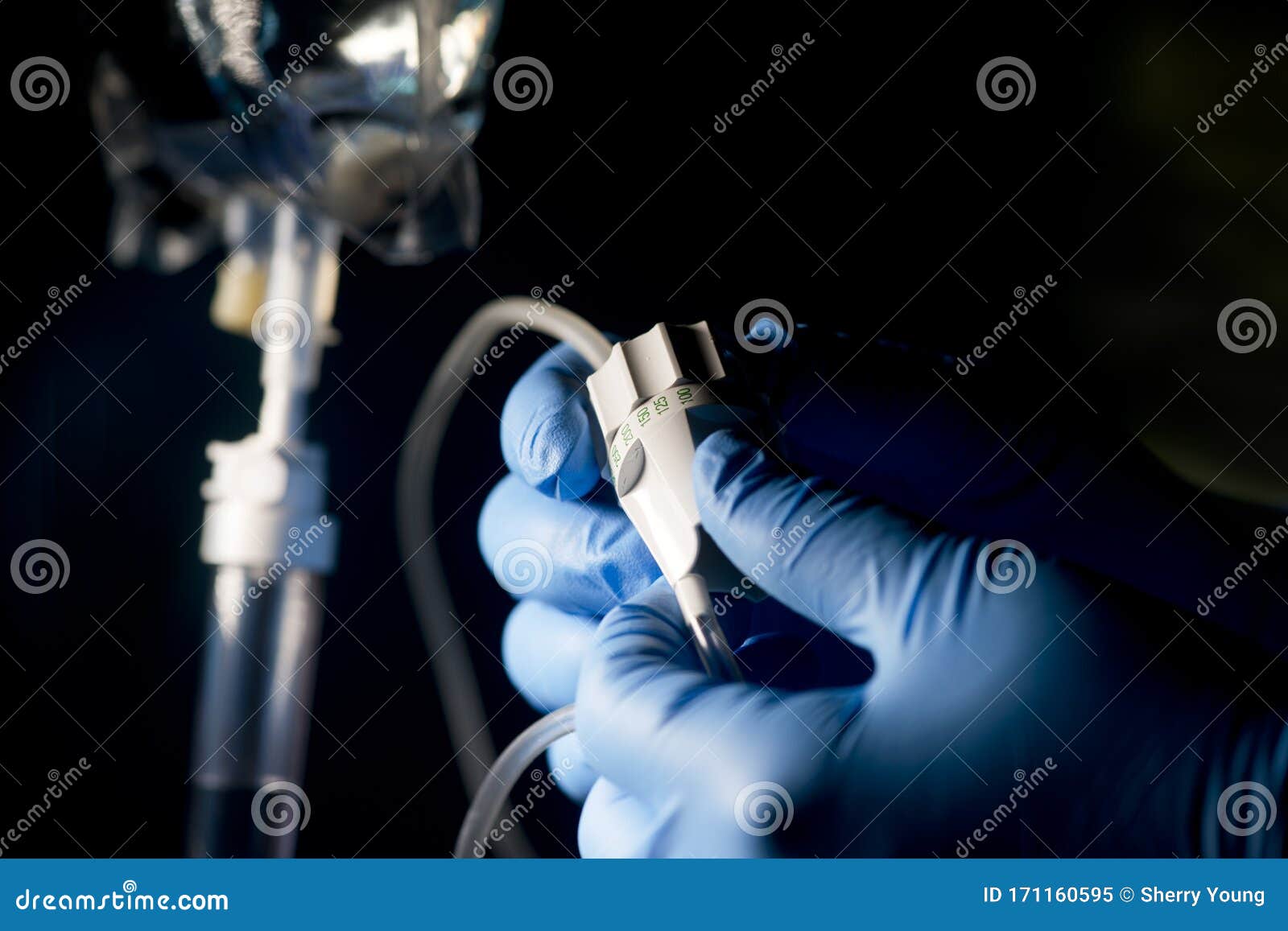 Nurse Adjusts IV Drip Flow Rate Stock Image - Image of infusion ...