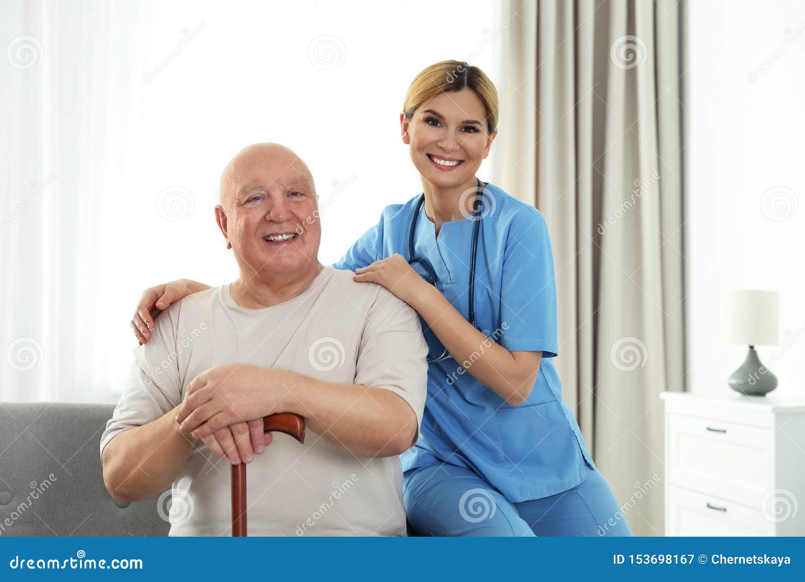 Nurse Assisting Elderly Man with Cane Stock Image - Image of pensioner ...