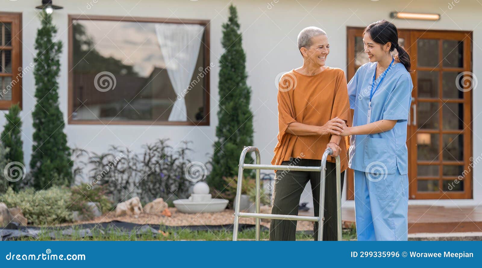 Caregiver Help And Care Asian Senior Woman Patient Sitting On ...