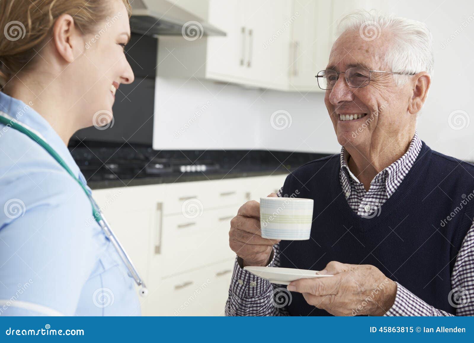 Nurse Chatting with Senior Man during Home Visit Stock Image - Image of ...