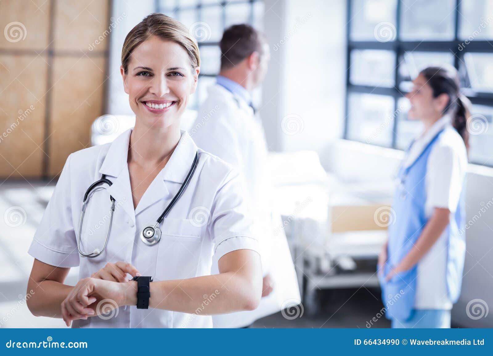 Nurse Checking Her Smart Watch Stock Photo - Image of caucasian, female ...