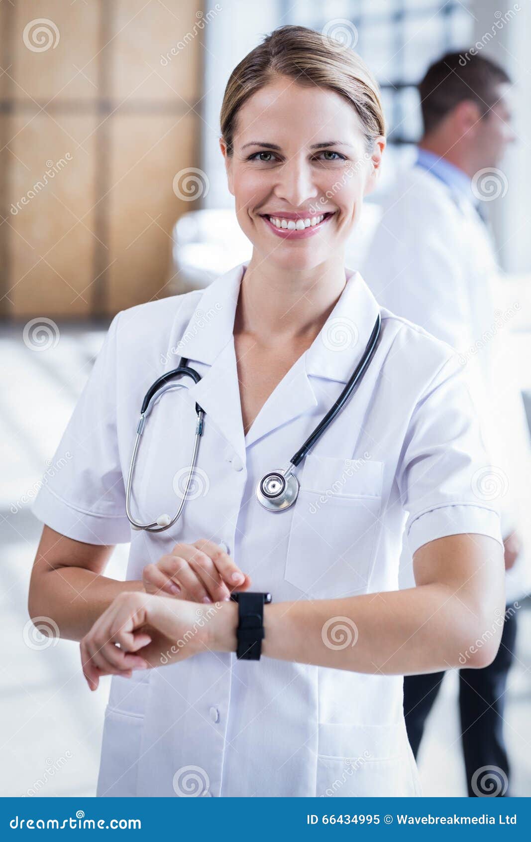 Nurse Checking Her Smart Watch Stock Image - Image of nurse, medical ...