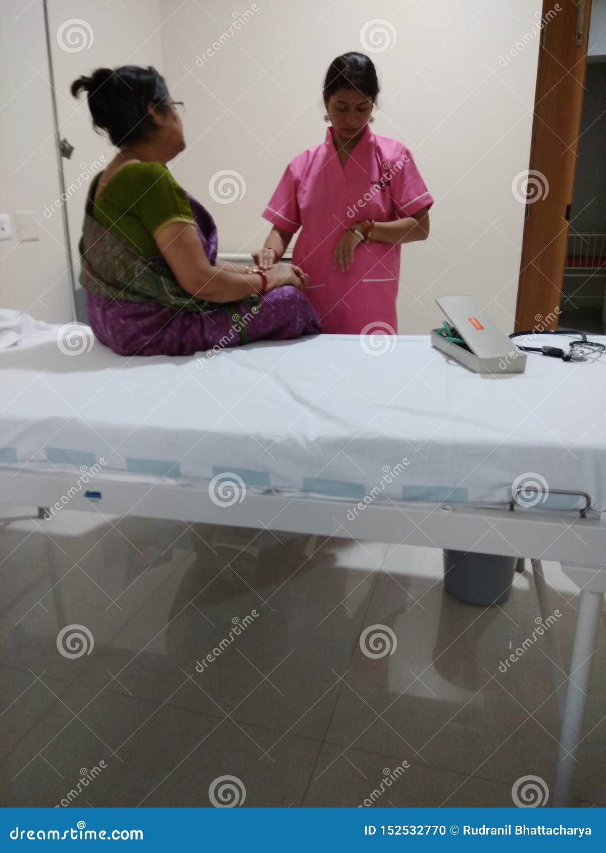 Nurse checking patient editorial image. Image of patient - 152532770