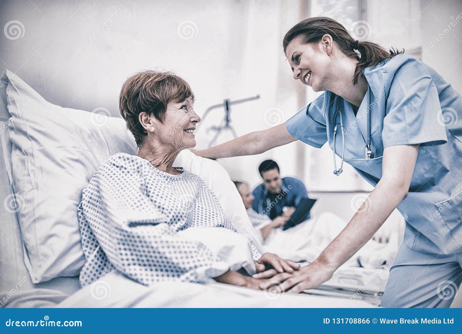 Nurse Consoling a Patient in Hospital Ward Stock Photo - Image of ...