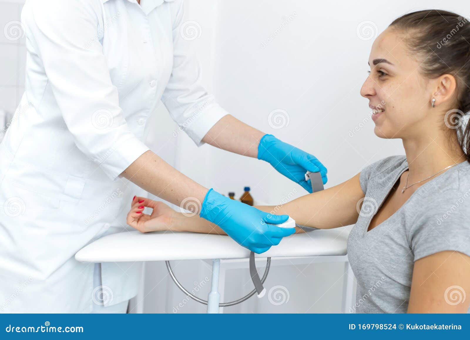 The Nurse Fastens the Clip on the Patient Hand before the Blood ...
