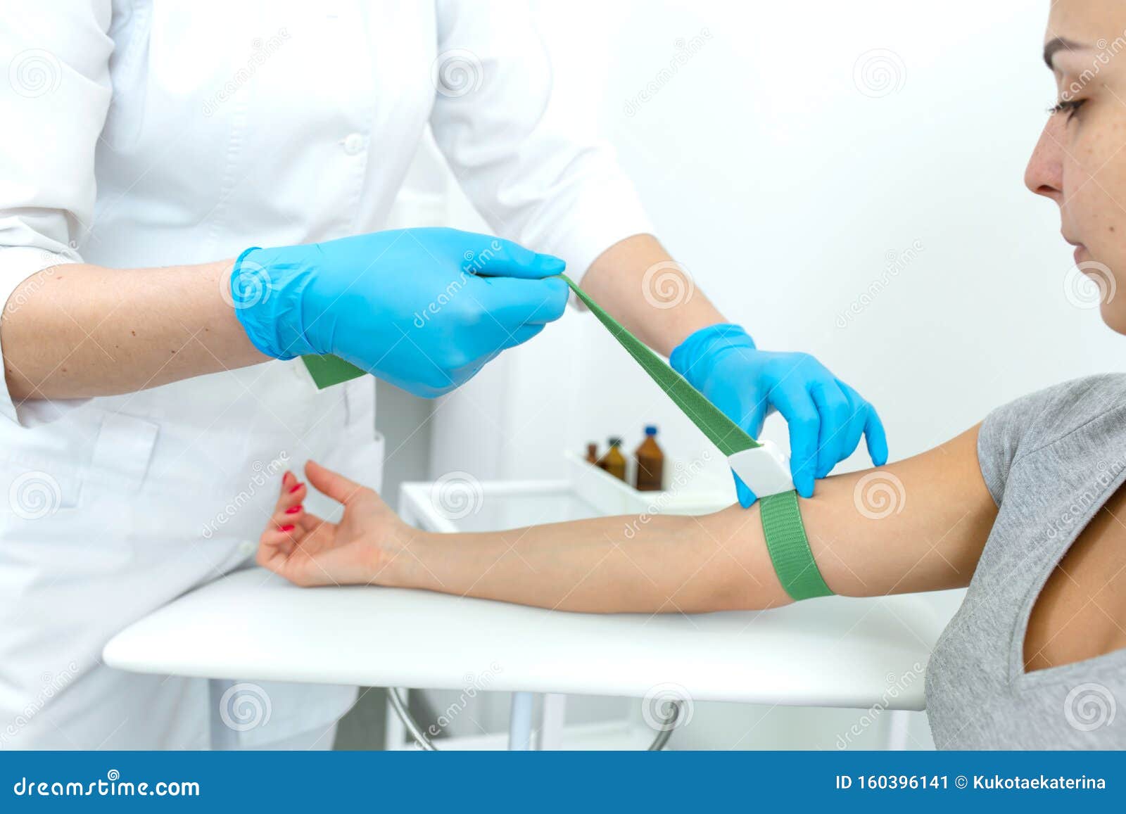The Nurse Fastens the Clip on the Patients Hand before the Blood ...