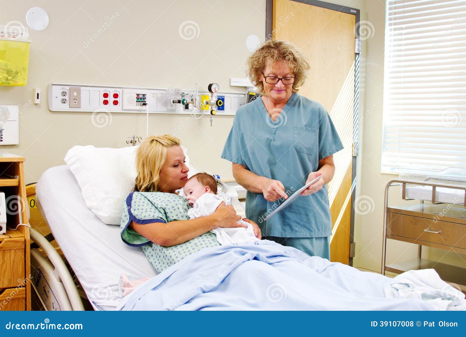 Nurse Giving Mom Instructions Using Tablet Stock Photo - Image of ... Nurse Giving Mom Instructions Using Tablet Stock Photo - Image of ...