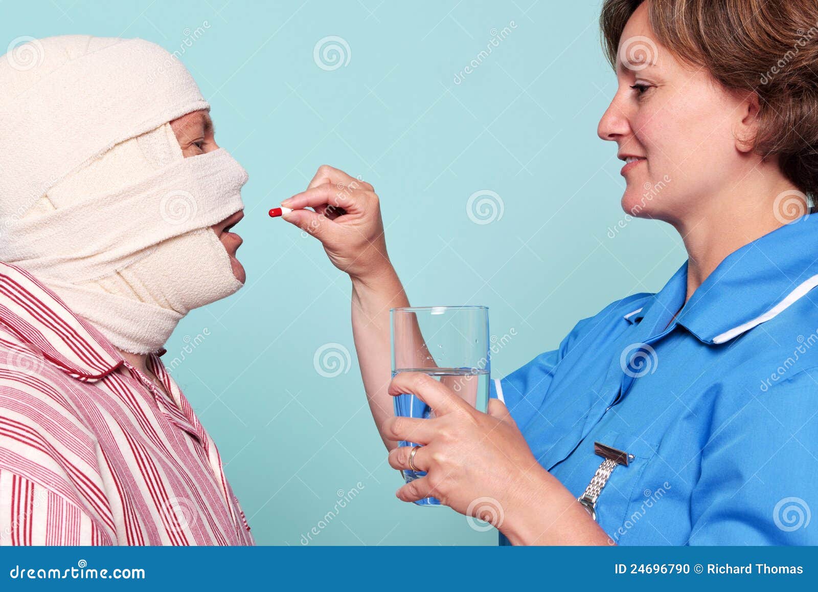 Nurse Giving a Patient Some Medicine Stock Photo - Image of patient ...