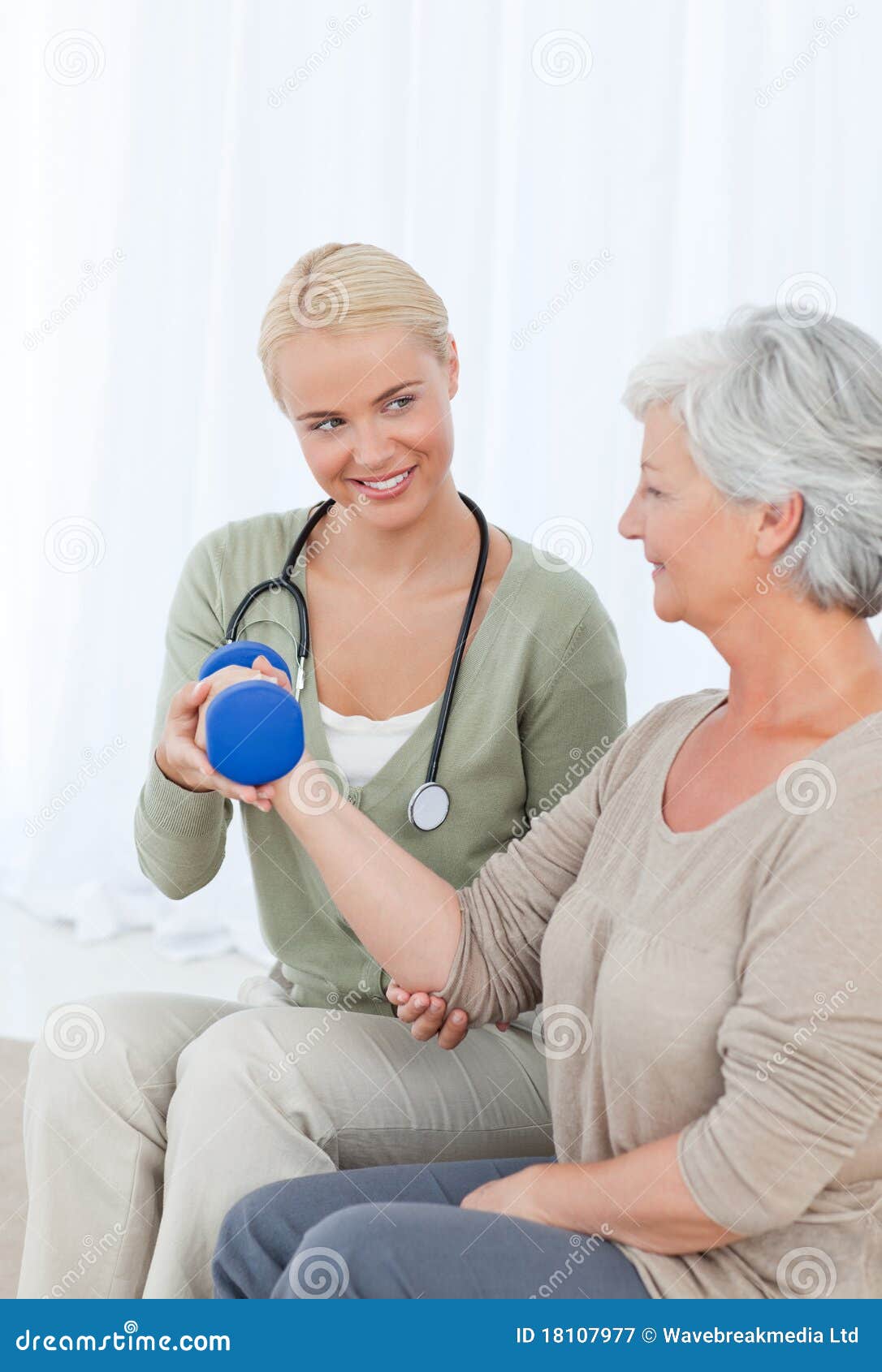 Nurse Helping Her Patient To Do Exercises Stock Image - Image of ...