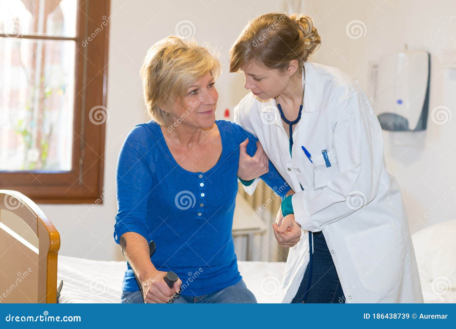 Nurse Helping Recovering Patient Stock Image - Image of physical ...
