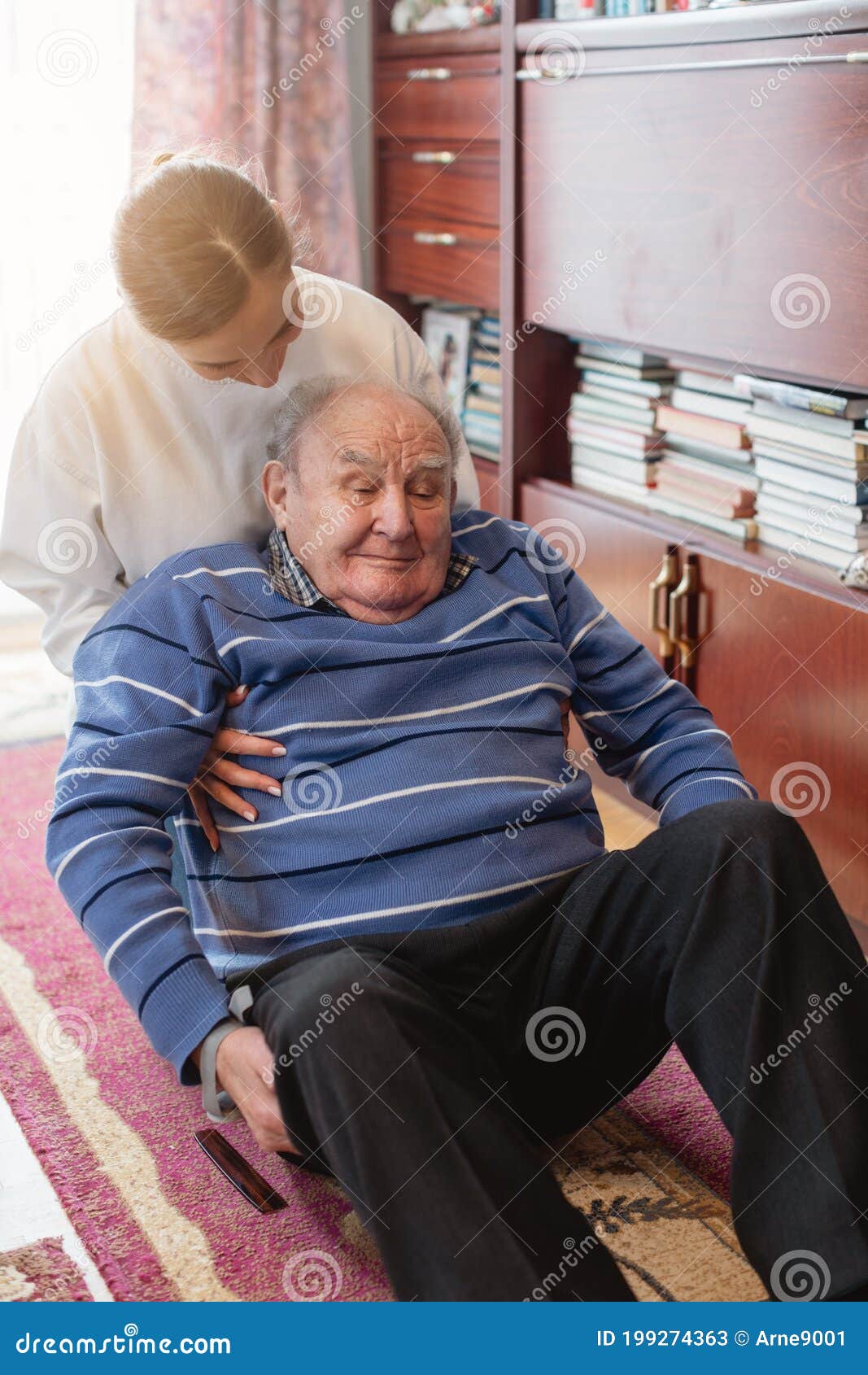 Nurse Helping Senior Man Getting Up after he Fell Stock Image - Image ...