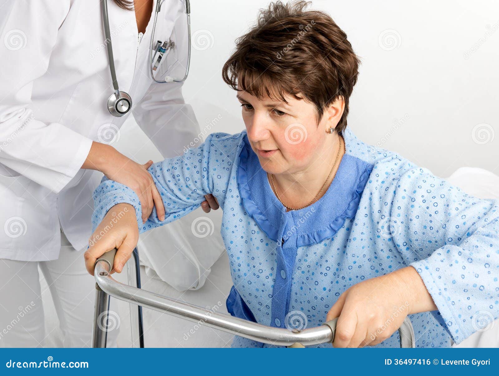 Nurse Helps a Patient To Get Up Stock Photo - Image of injury, nurse ...