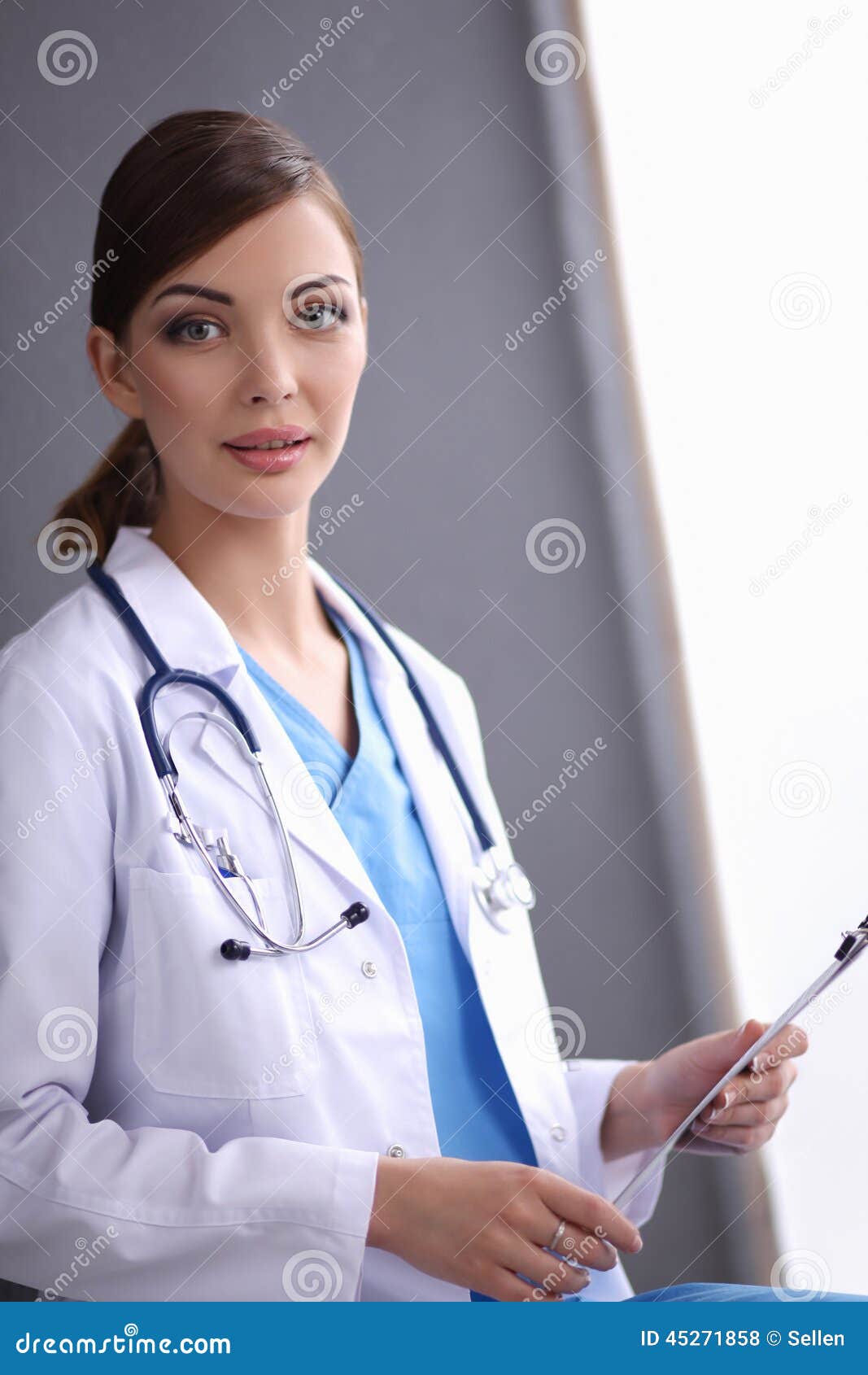 Nurse Holding Folder and Taking Notes - Isolated Stock Photo - Image of ...